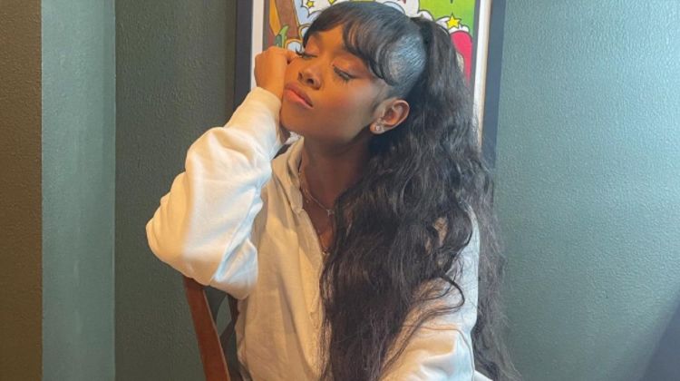 The Reason H.E.R. Always Wears Sunglasses – TVovermind